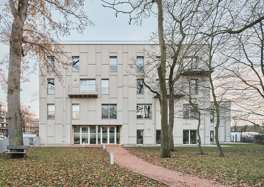 Woof & Skelle: Building ensemble for social housing and kindergarten ...